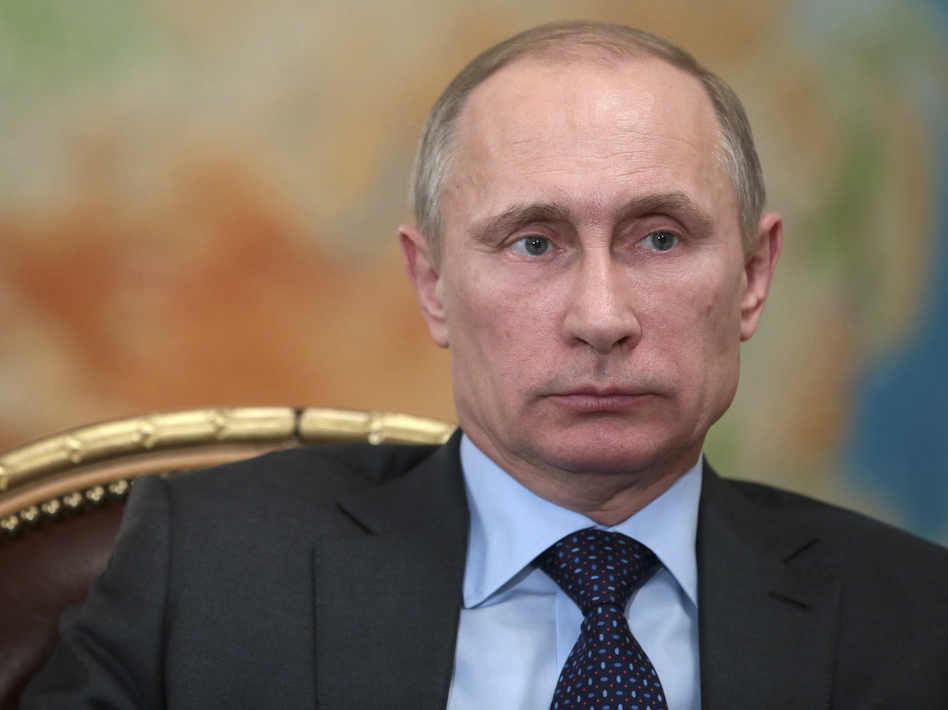 Putin Flexes Moscow's Military Muscles, Puts Army On Alert