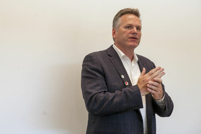 Gov. Dunleavy introduces budget with larger PFDs, with cuts to come
