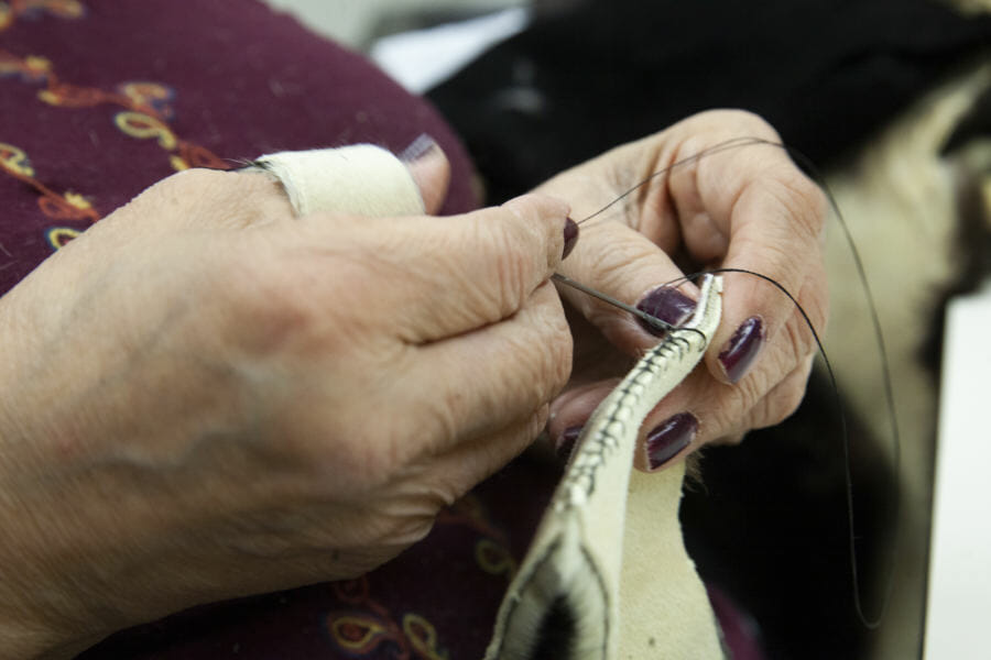 Otter skin-sewing workshops promote 'sustainable cottage industry' in ...