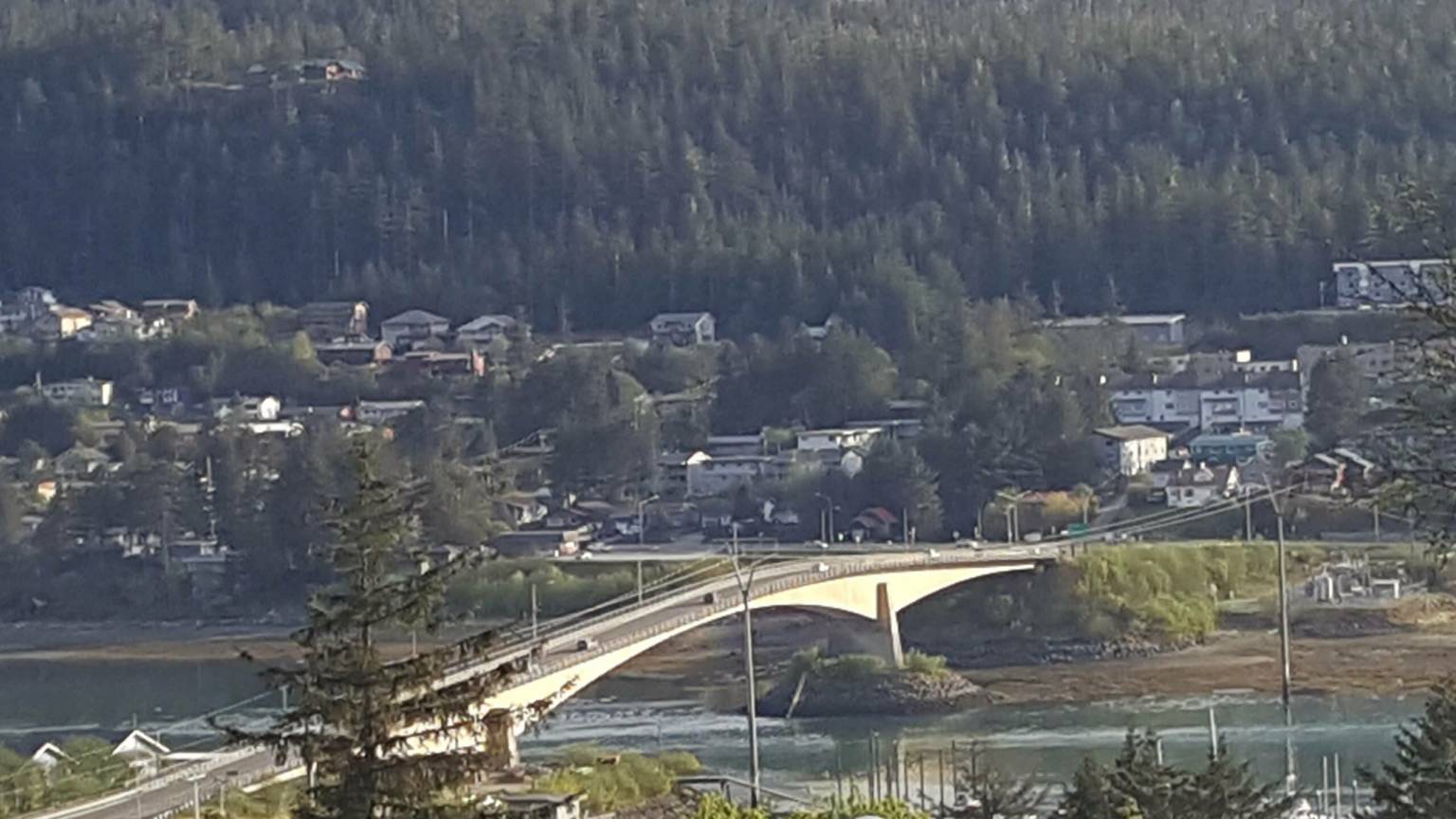 A barge carrying a crane hit the underside of Juneau's Douglas Bridge