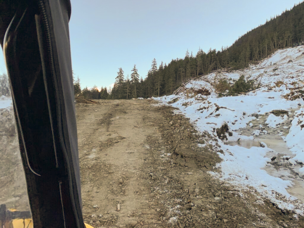 Displaced Haines residents use makeshift road to cross landslide and ...