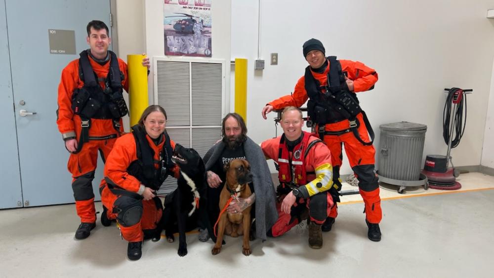 Juneau fisherman, 2 dogs rescued after abandoning ship