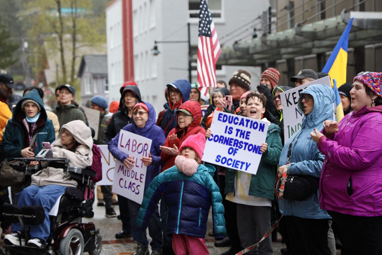 May Day protesters rally for workers’ rights outside the Alaska State ...